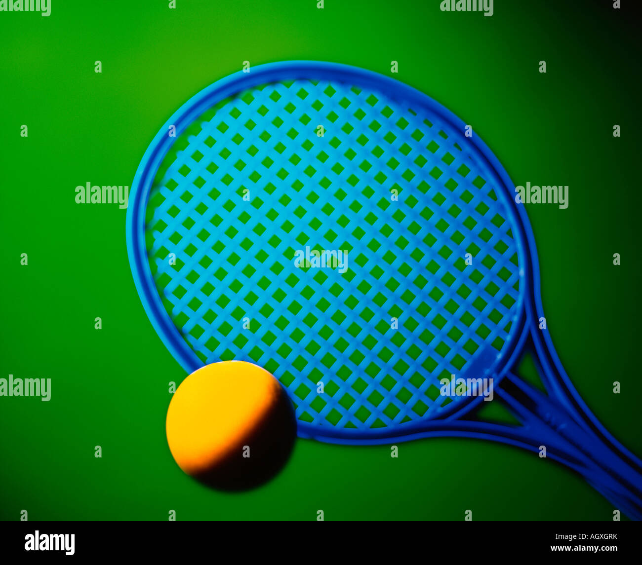 blue tennis racket & yellow ball Stock Photo - Alamy