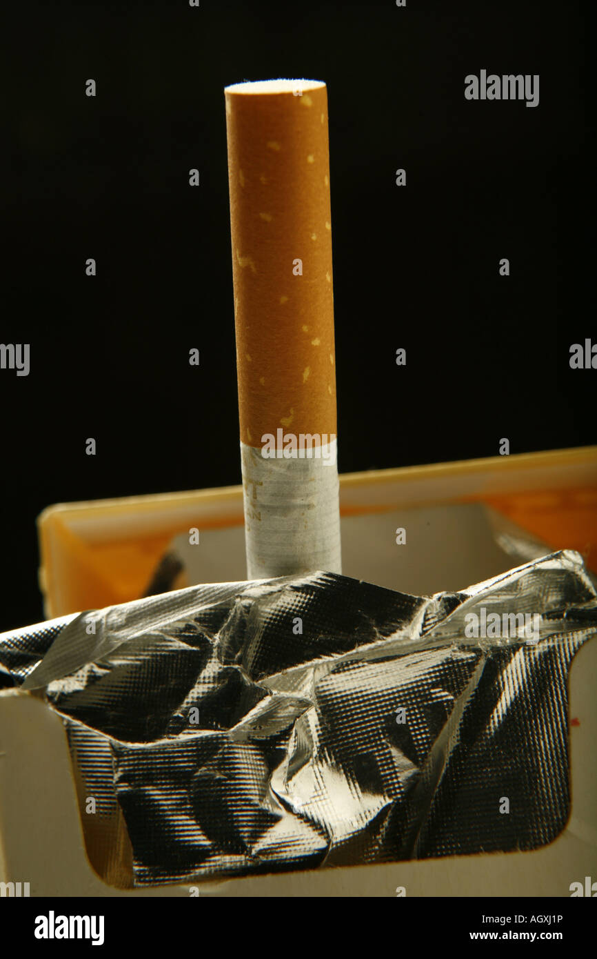 Box of cigarettes, one cigarette, last cigarette Stock Photo - Alamy