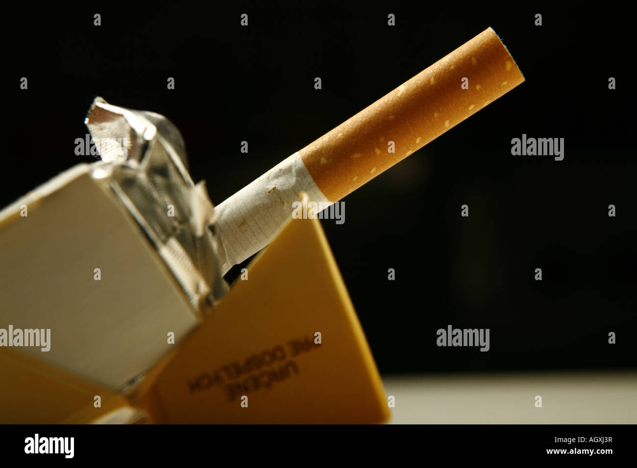 Box of cigarettes, one cigarette, last cigarette Stock Photo - Alamy