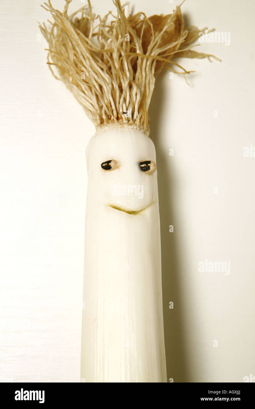 Funny green spring onions. Still-life Stock Photo - Alamy