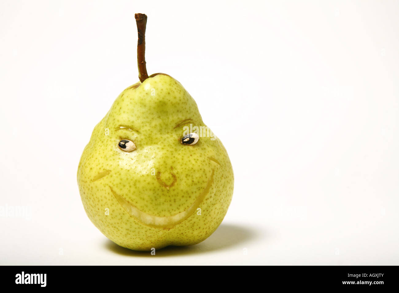 Funny pear on white background Stock Photo - Alamy