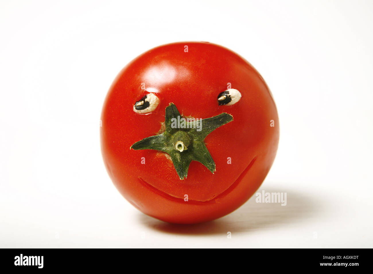 Funny tomatoes on white background Stock Photo - Alamy