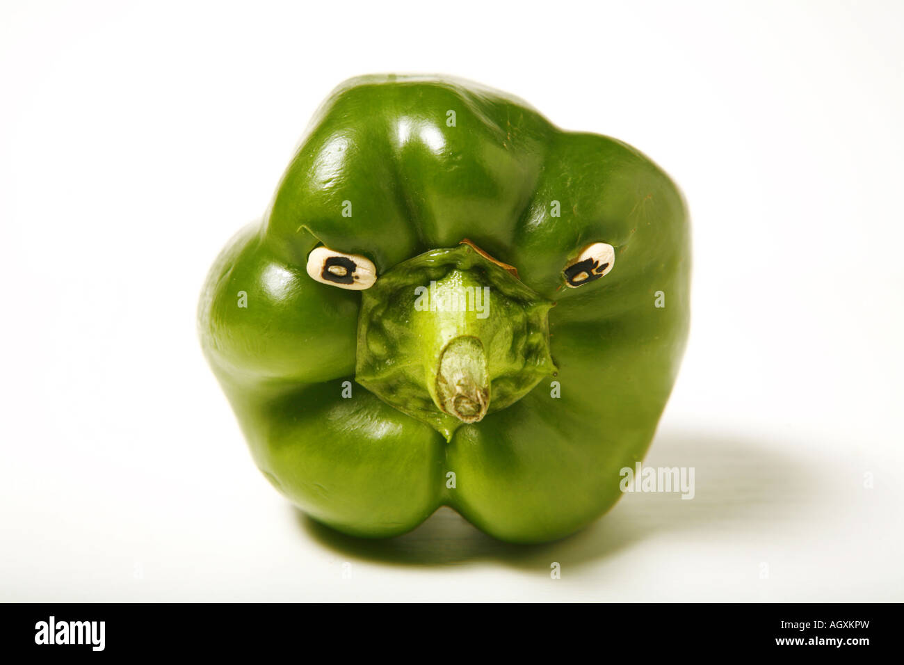 Funny pepper on white background Stock Photo - Alamy