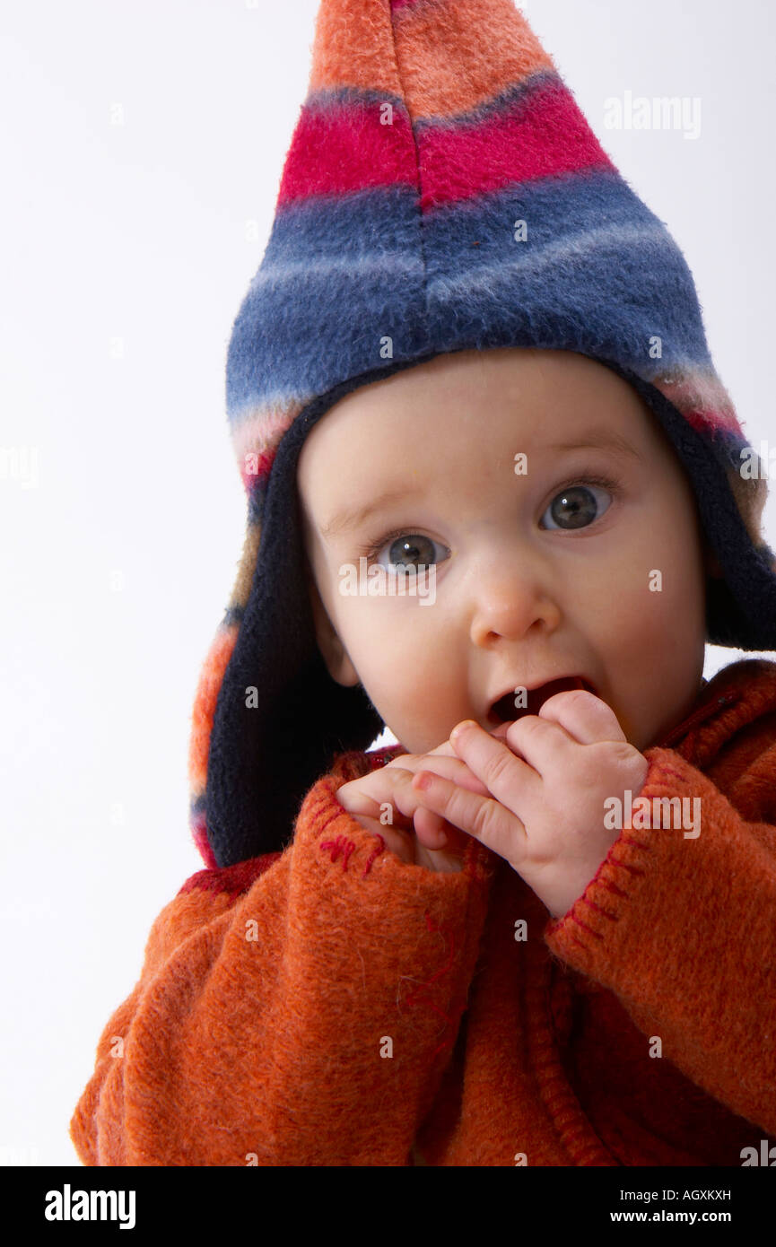 baby in colourful woollen clothes Stock Photo - Alamy