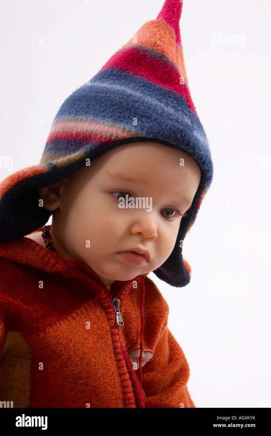 baby in colourful woollen clothes Stock Photo - Alamy