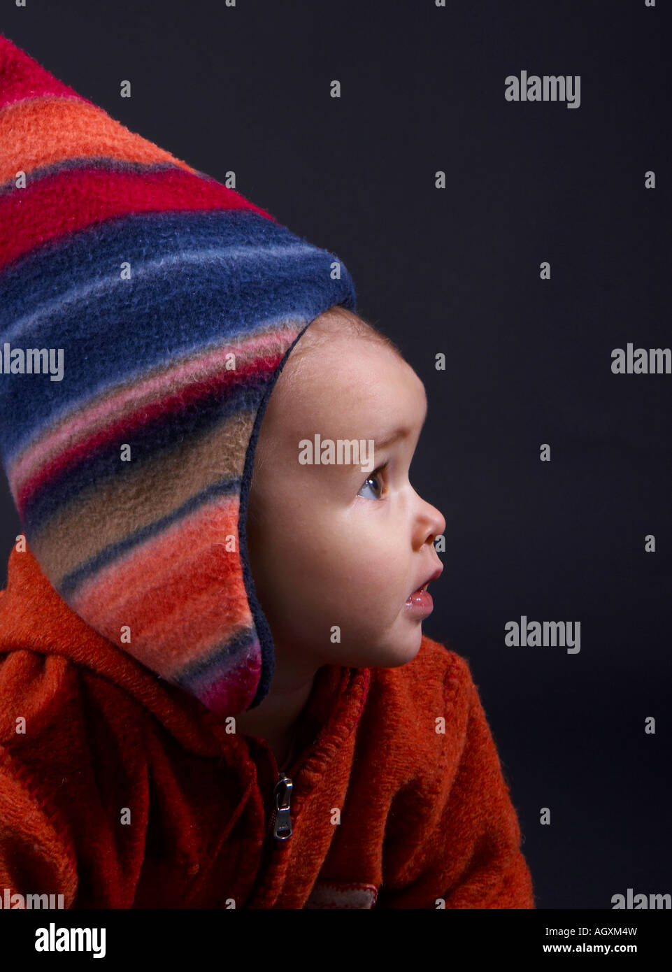 baby in colourful woollen clothes Stock Photo - Alamy
