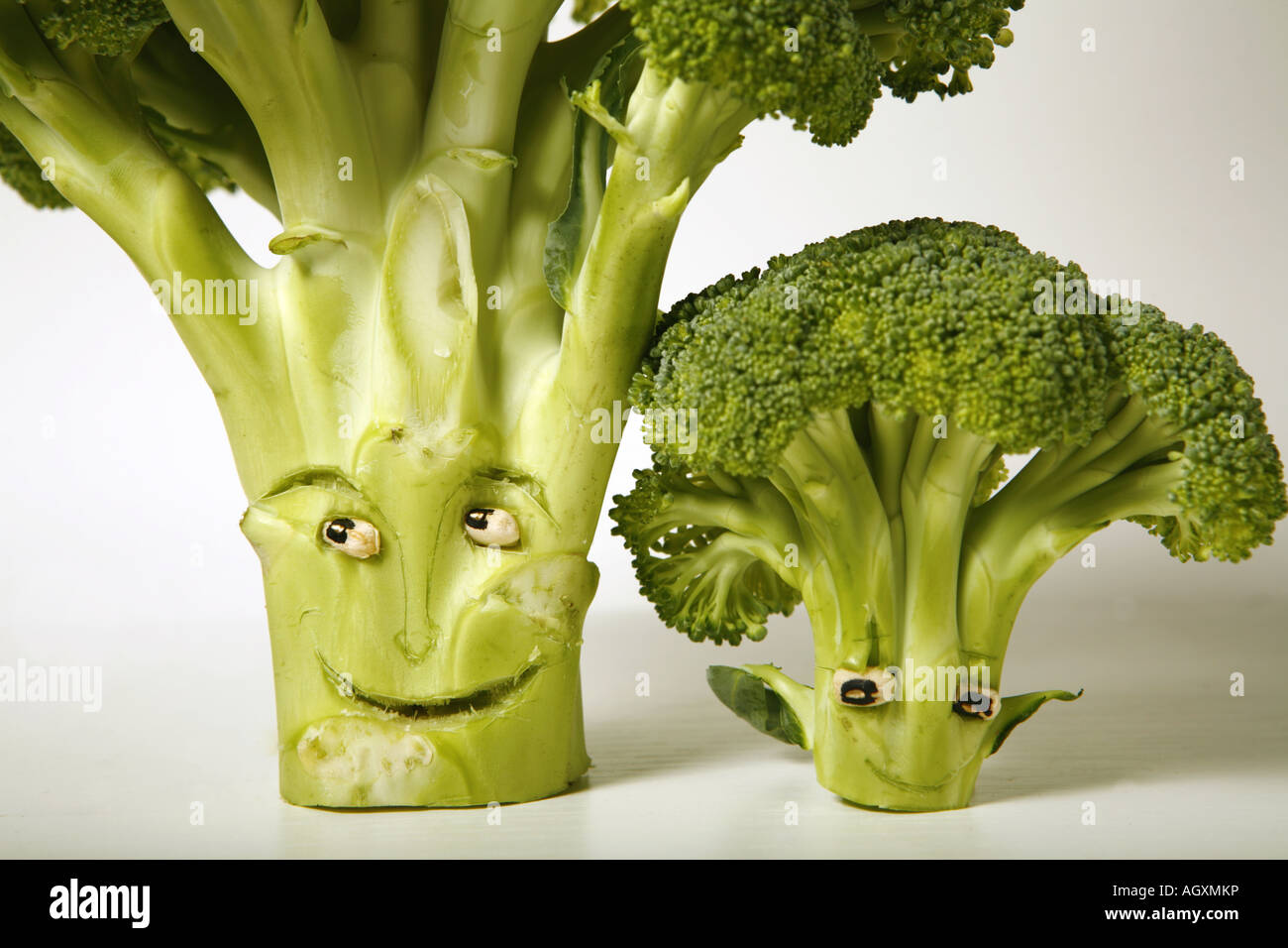 Funny broccoli on white background Stock Photo - Alamy