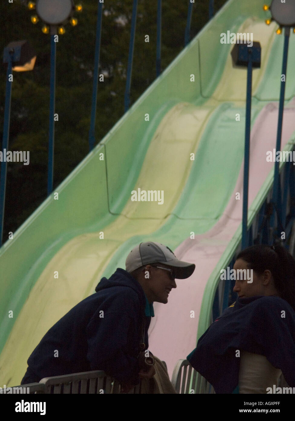 Carnival ride worker at the Belfast summer fair Stock Photo - Alamy