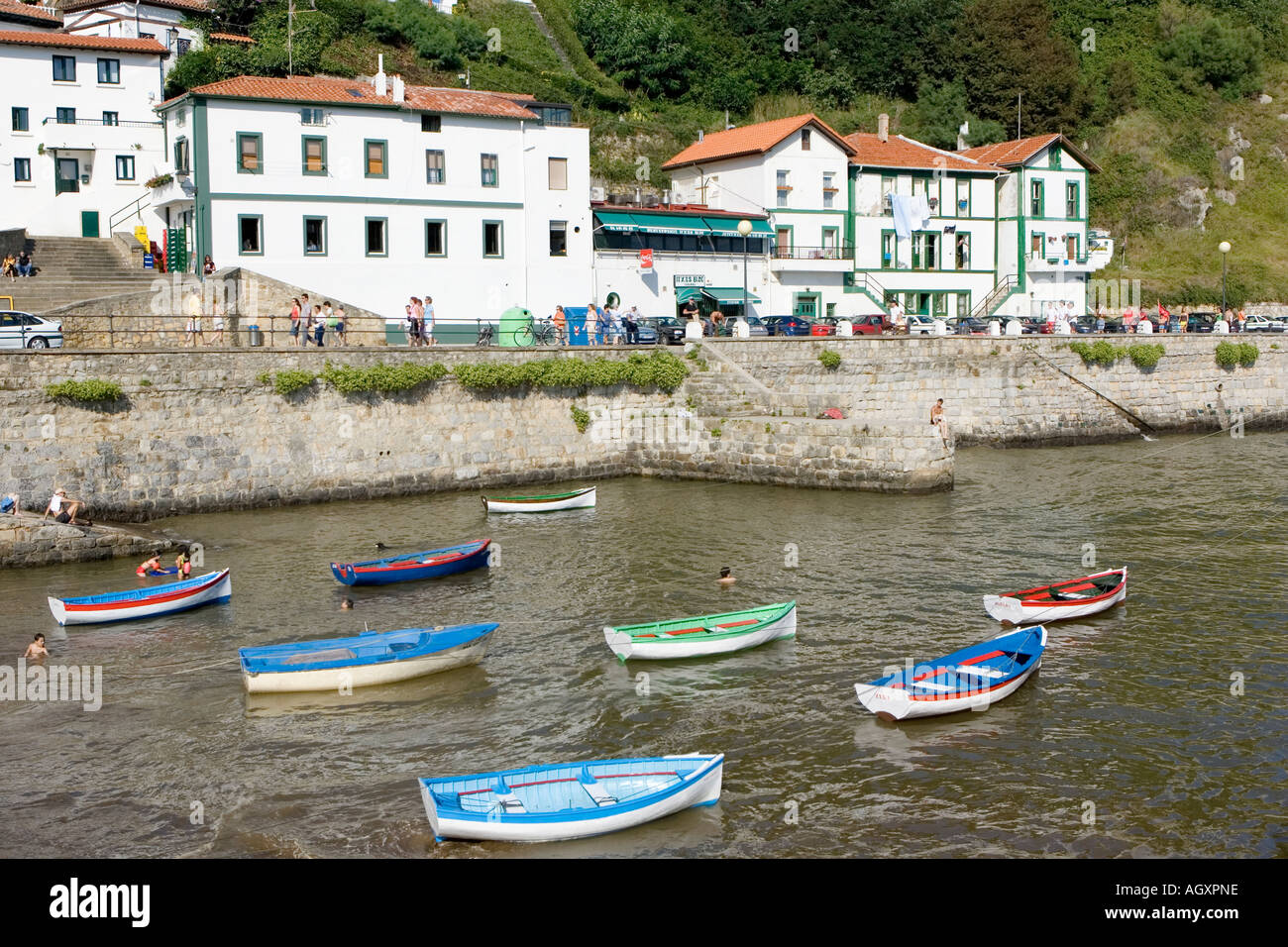 Group of colourful rowing boats at moorings Puerto Viejo de Algorta ...
