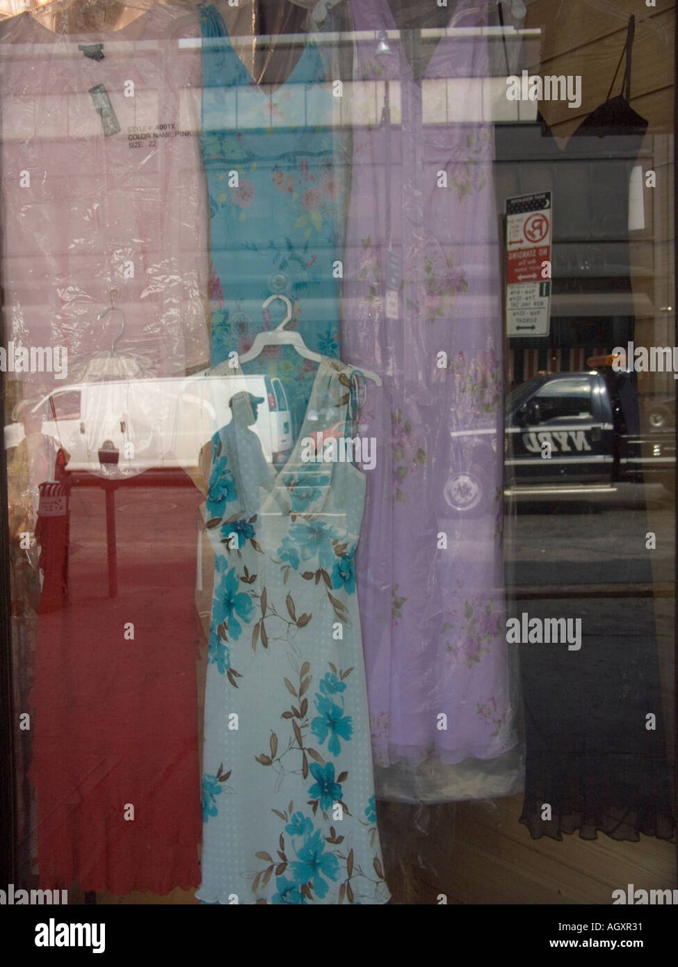 Reflections in a shop window Stock Photo - Alamy