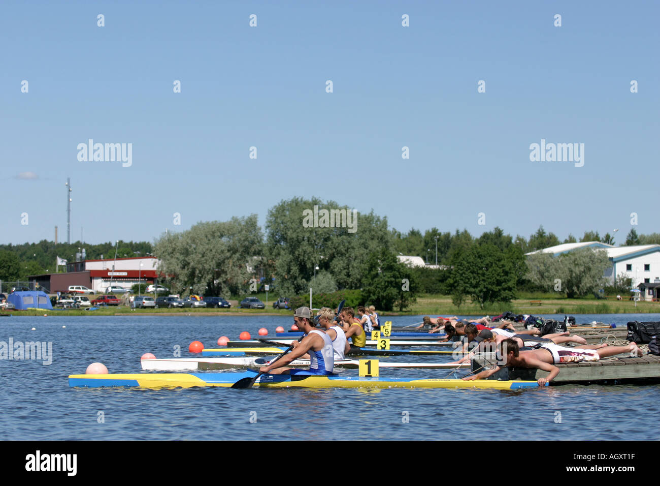 Waiting to start a canoe race Stock Photo - Alamy