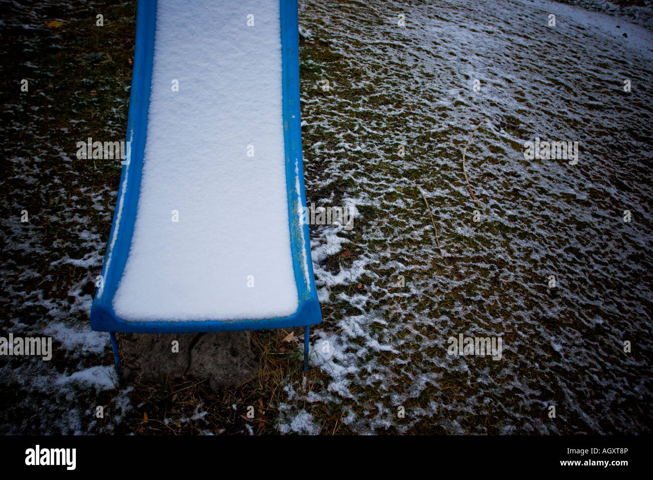 Slide covered with snow in a park Stock Photo - Alamy