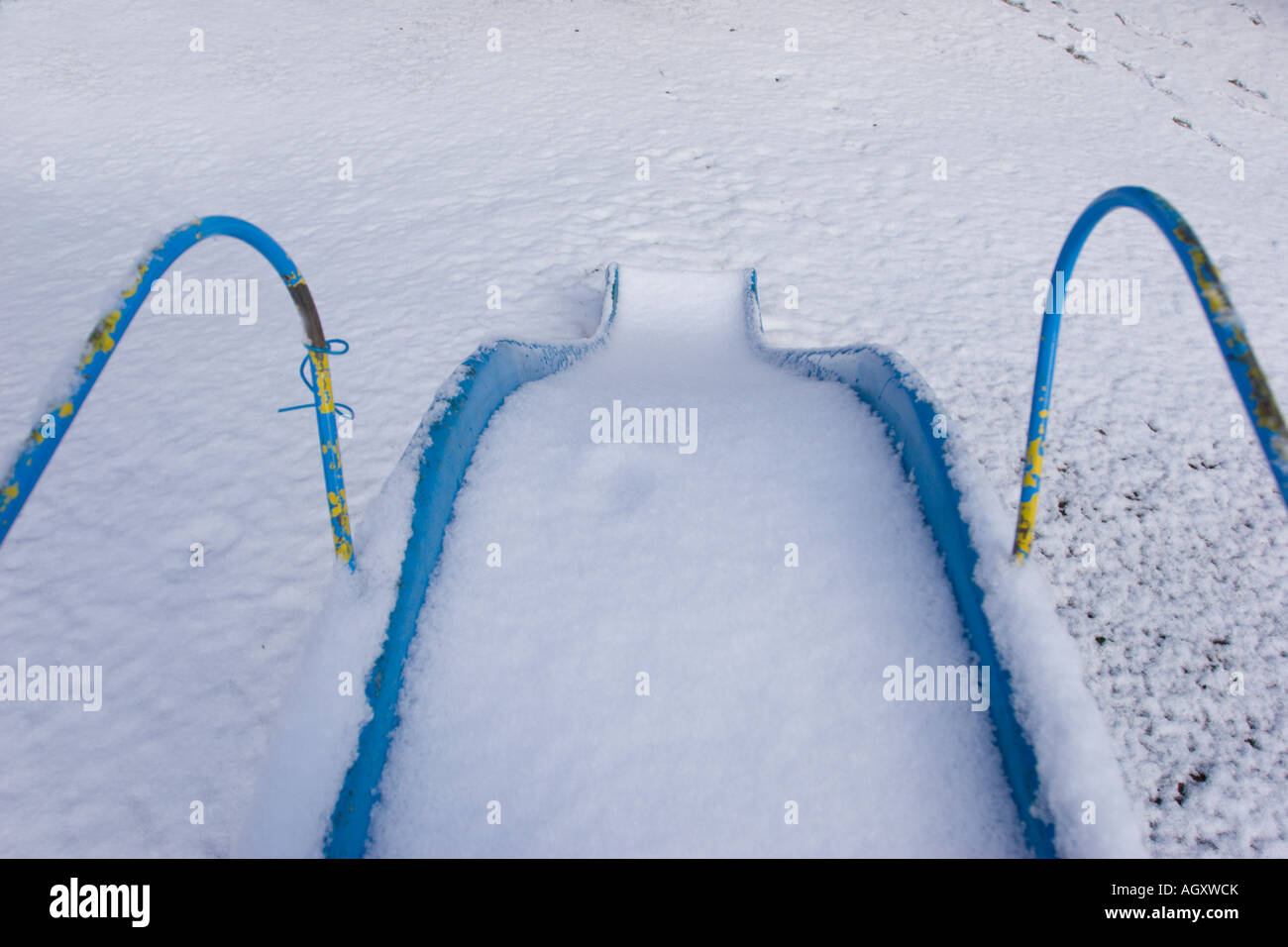 Slide covered with snow Stock Photo - Alamy