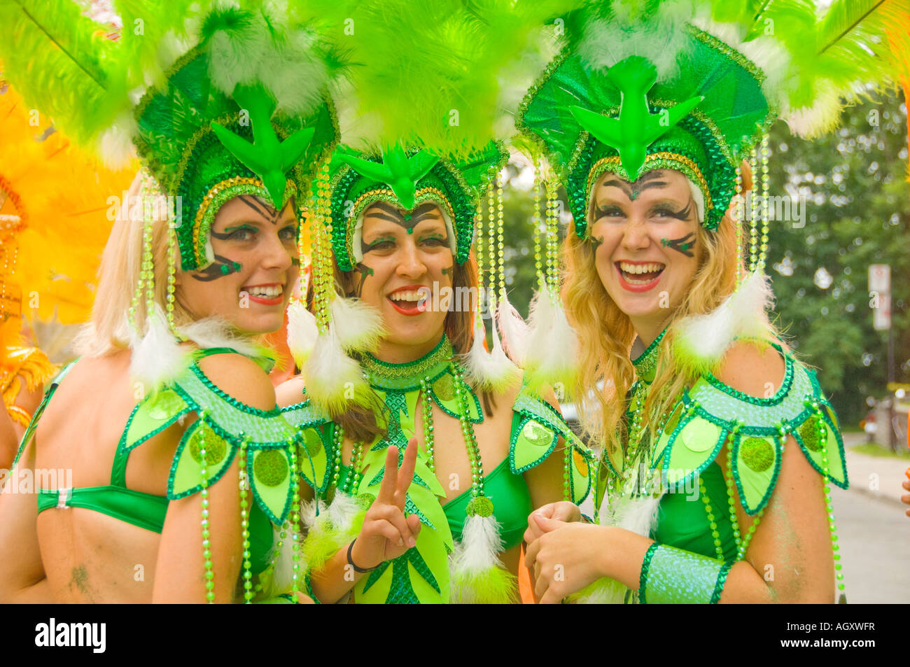 Canada Montreal Quebec Colorful costume paraders marching in the annual ...