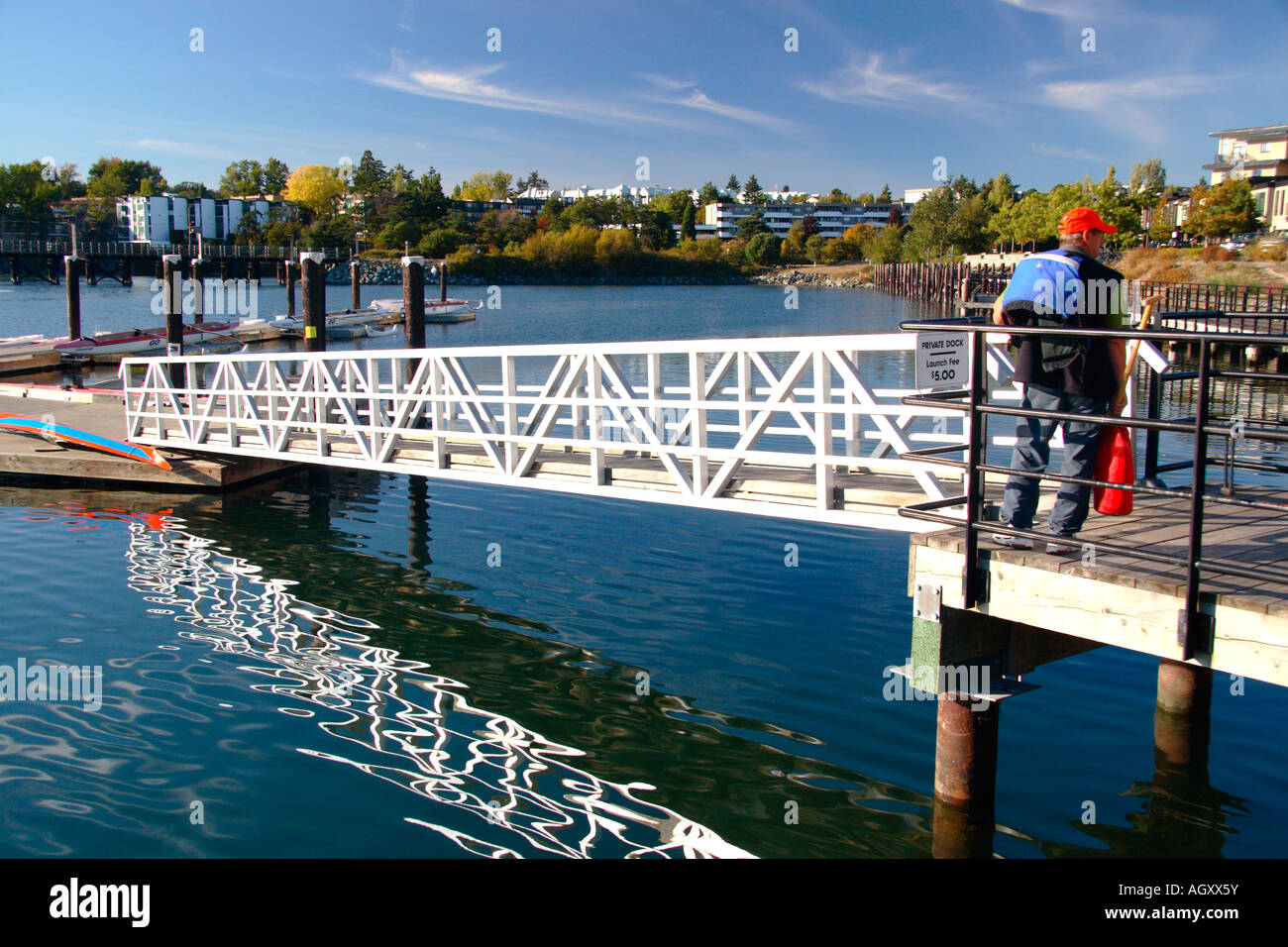 man getting ready to go rowing Stock Photo - Alamy