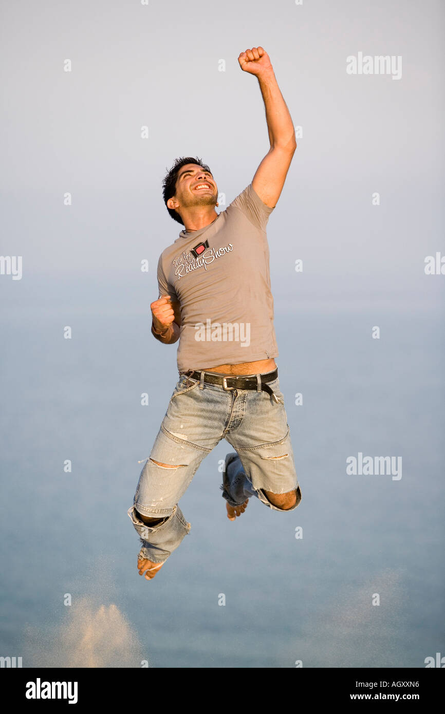 Nice Looking Male Model Jumping in the Air Stock Photo - Alamy