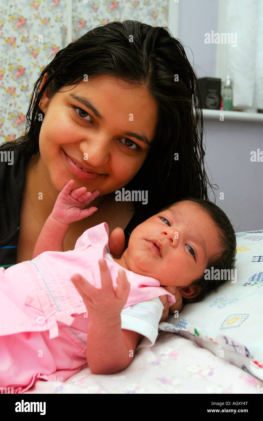 23 year old mother with her 19 day old baby boy, Southall, Middlesex ...