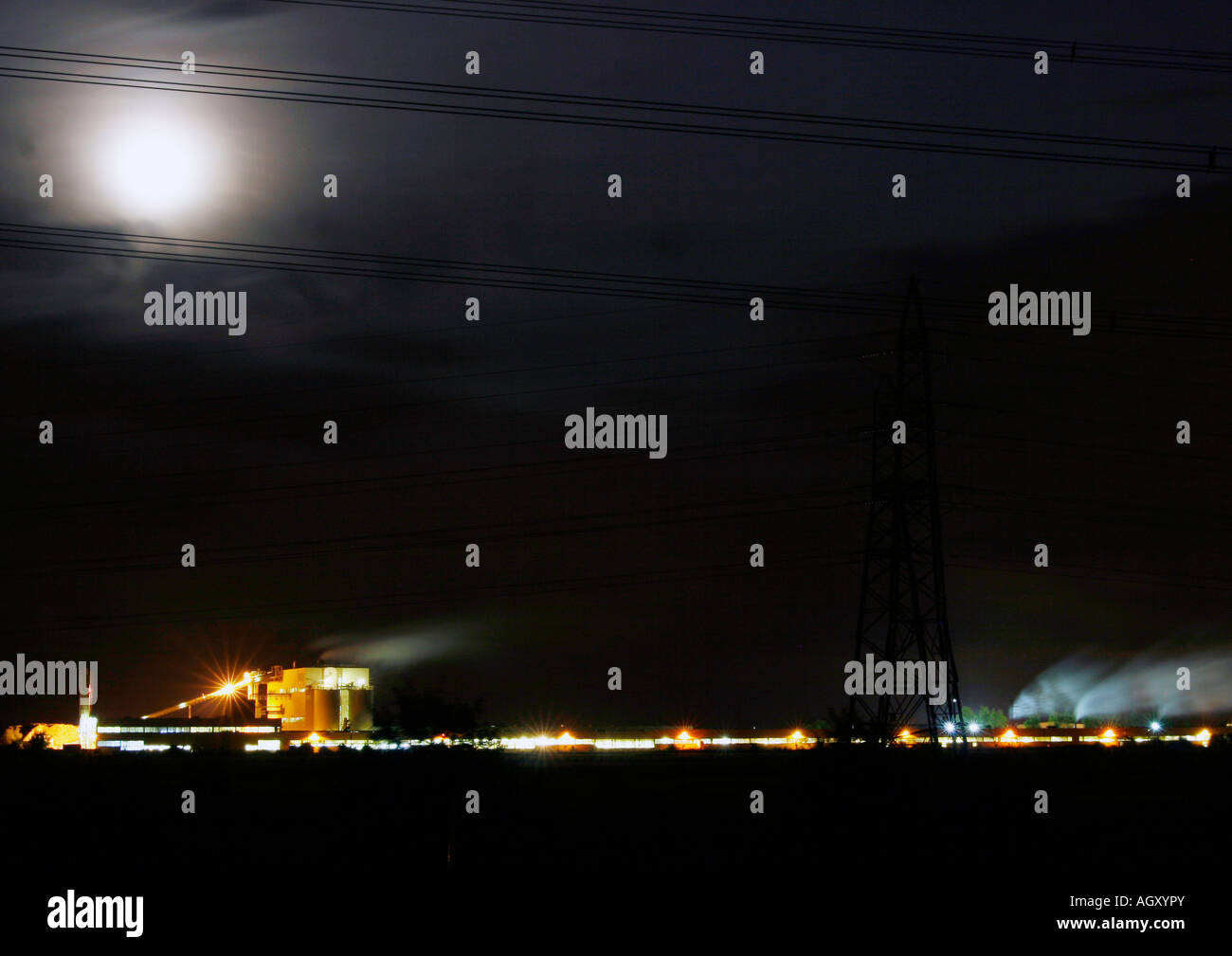 Full moon over the smoke Stock Photo - Alamy