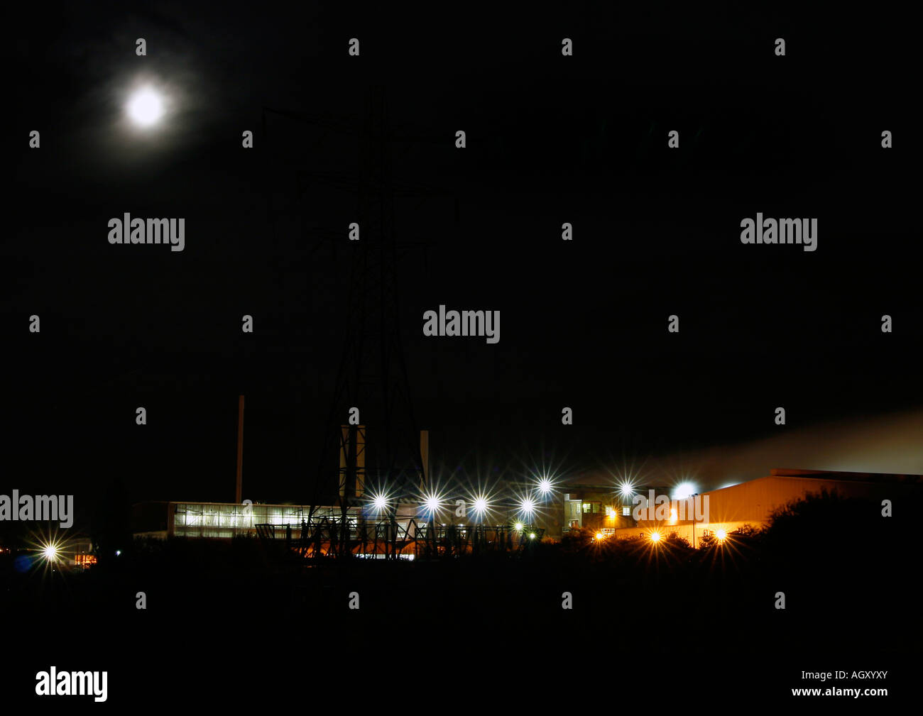Full moon over the smoke Stock Photo - Alamy
