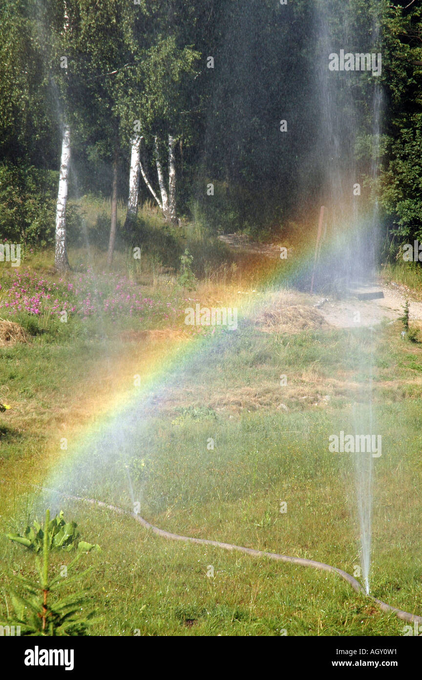 Hose rainbow garden hi-res stock photography and images - Alamy