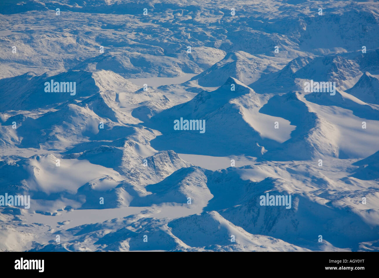 Snow covered mountains in Greenland Stock Photo - Alamy