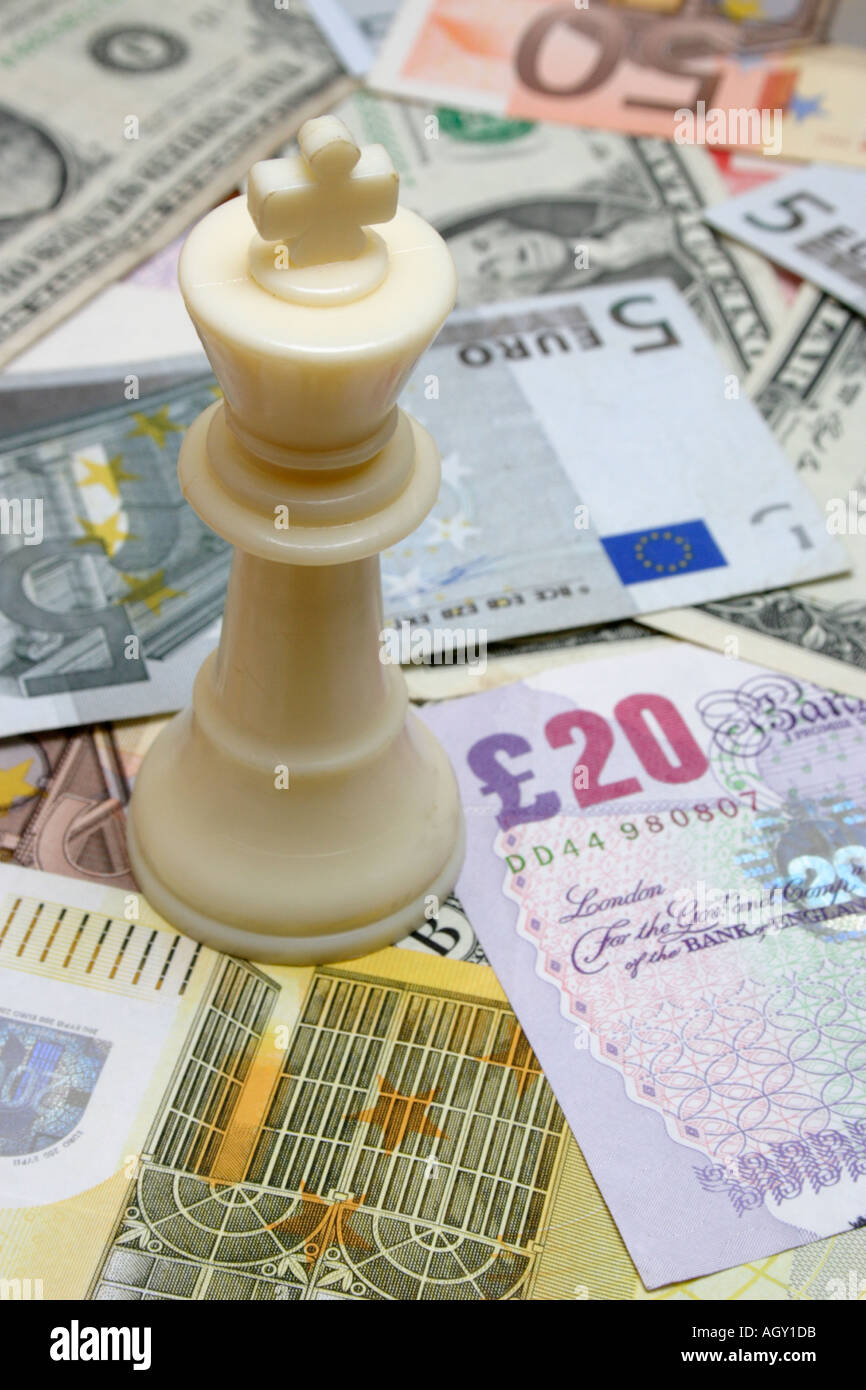 king sitting on cash cash is king Stock Photo - Alamy