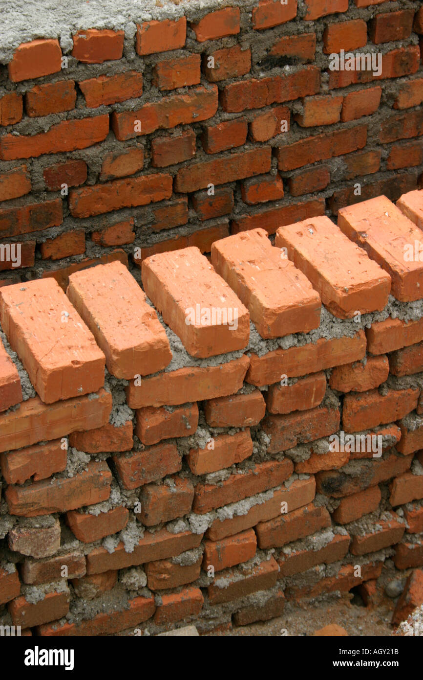 a partially built brick wall with strategic copyspace for letters Stock ...