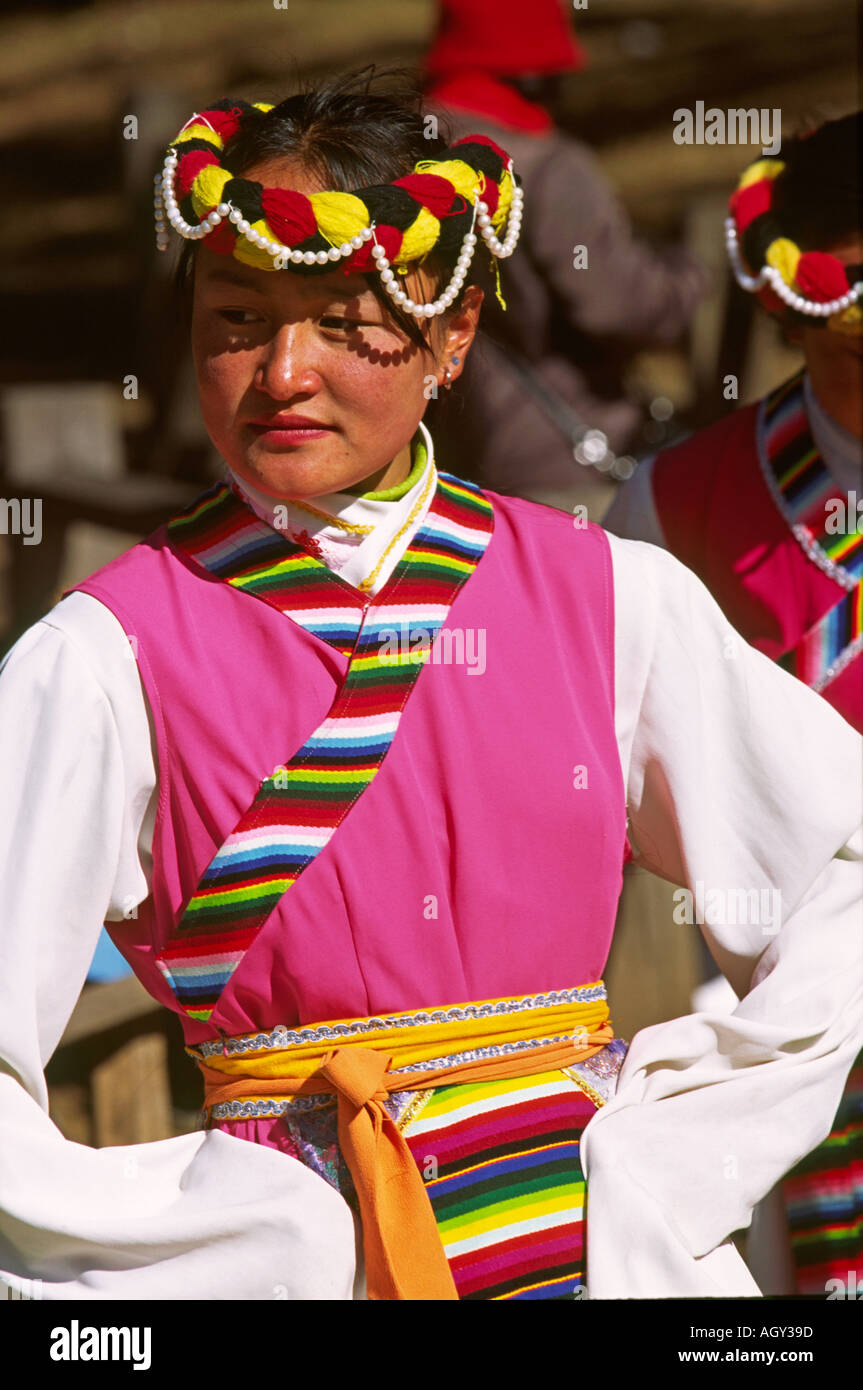 China Yunnan Lijiang Jade Dragon Snow Mountain Naxi girl dancing Stock ...