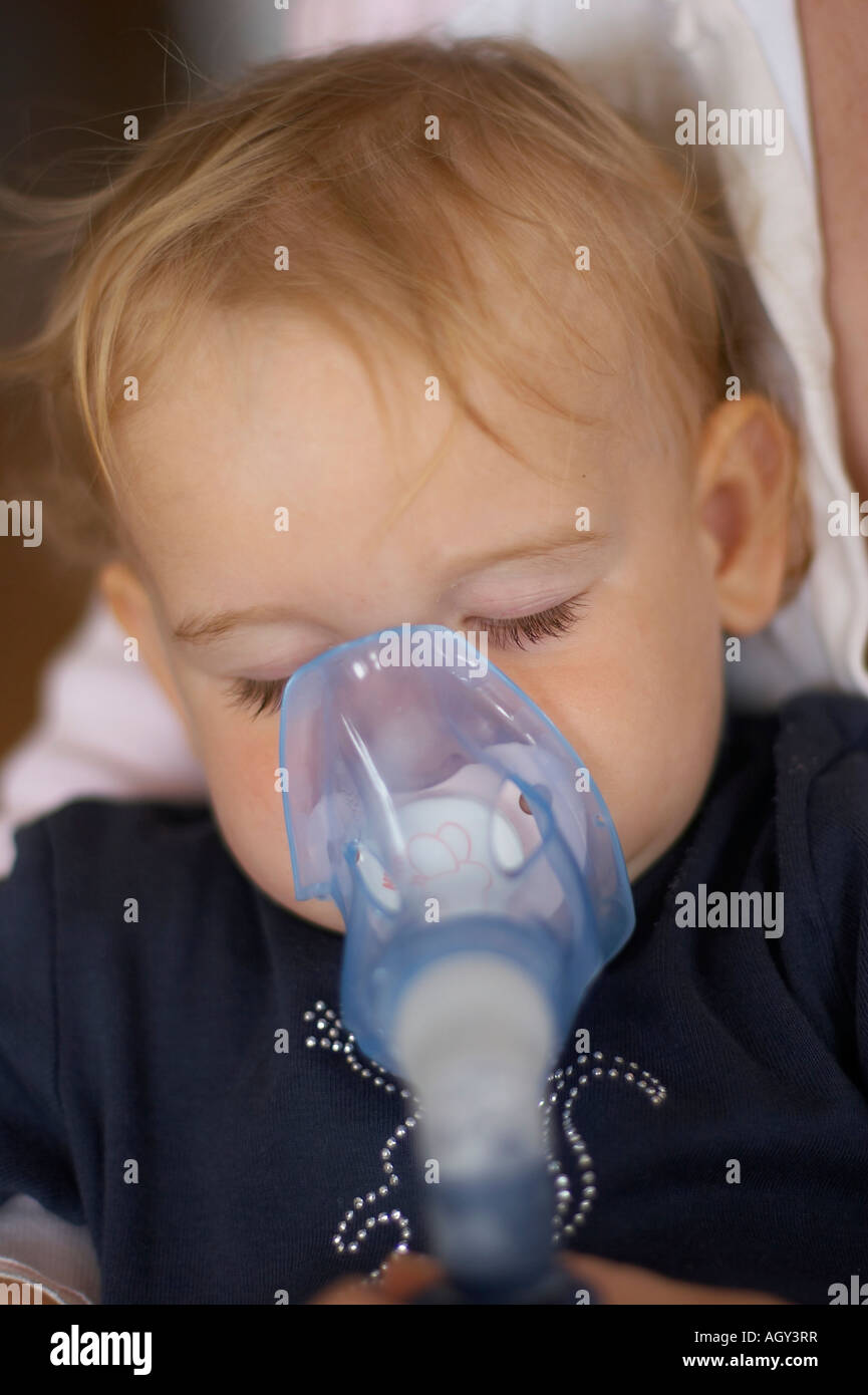 sick child inhaling Stock Photo - Alamy