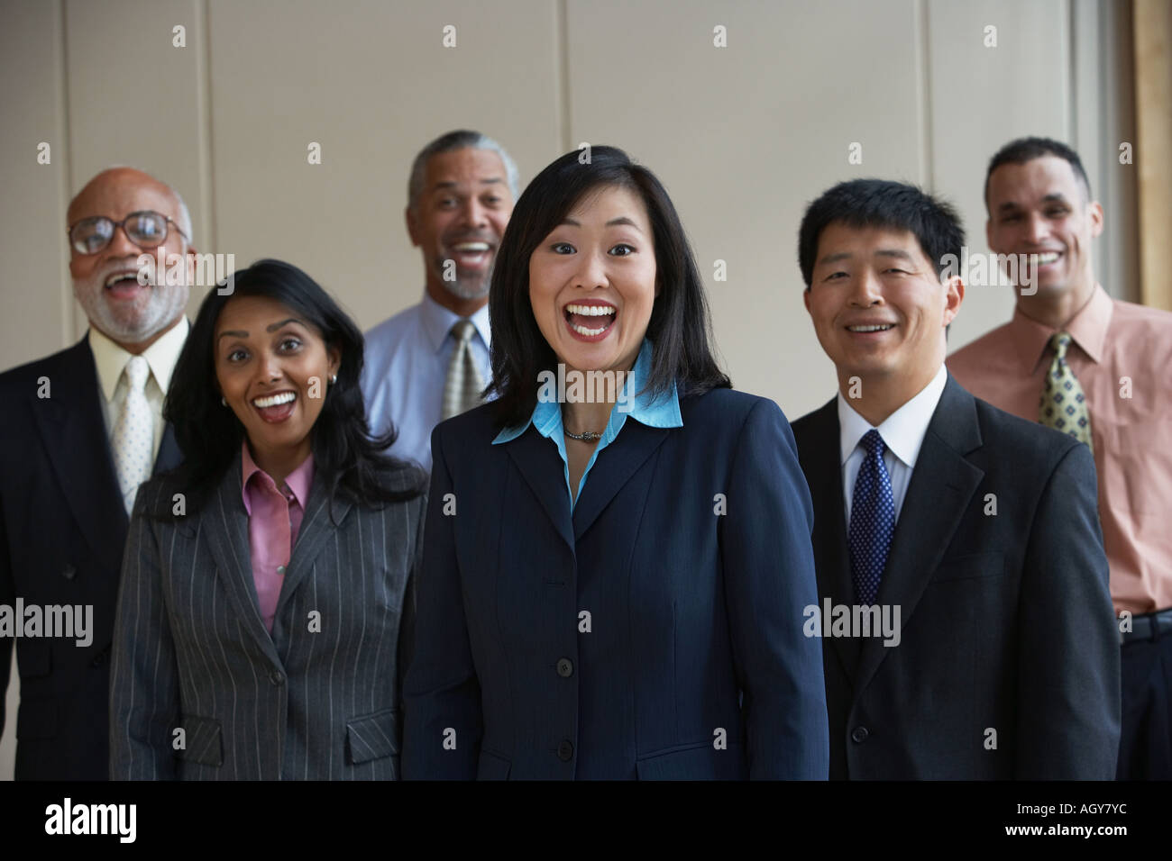 Group of co workers laughing Stock Photo - Alamy