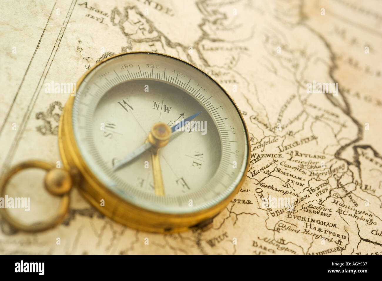 Closeup of a map and compass Stock Photo - Alamy