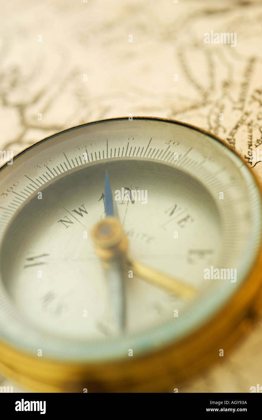Closeup of a map and compass Stock Photo - Alamy
