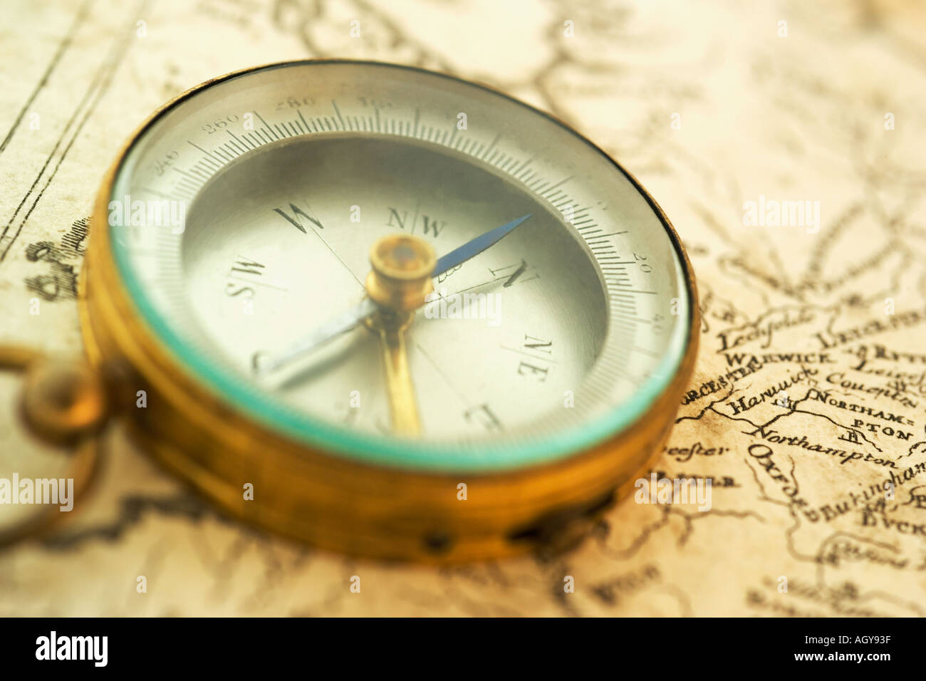 Closeup of a map and compass Stock Photo - Alamy