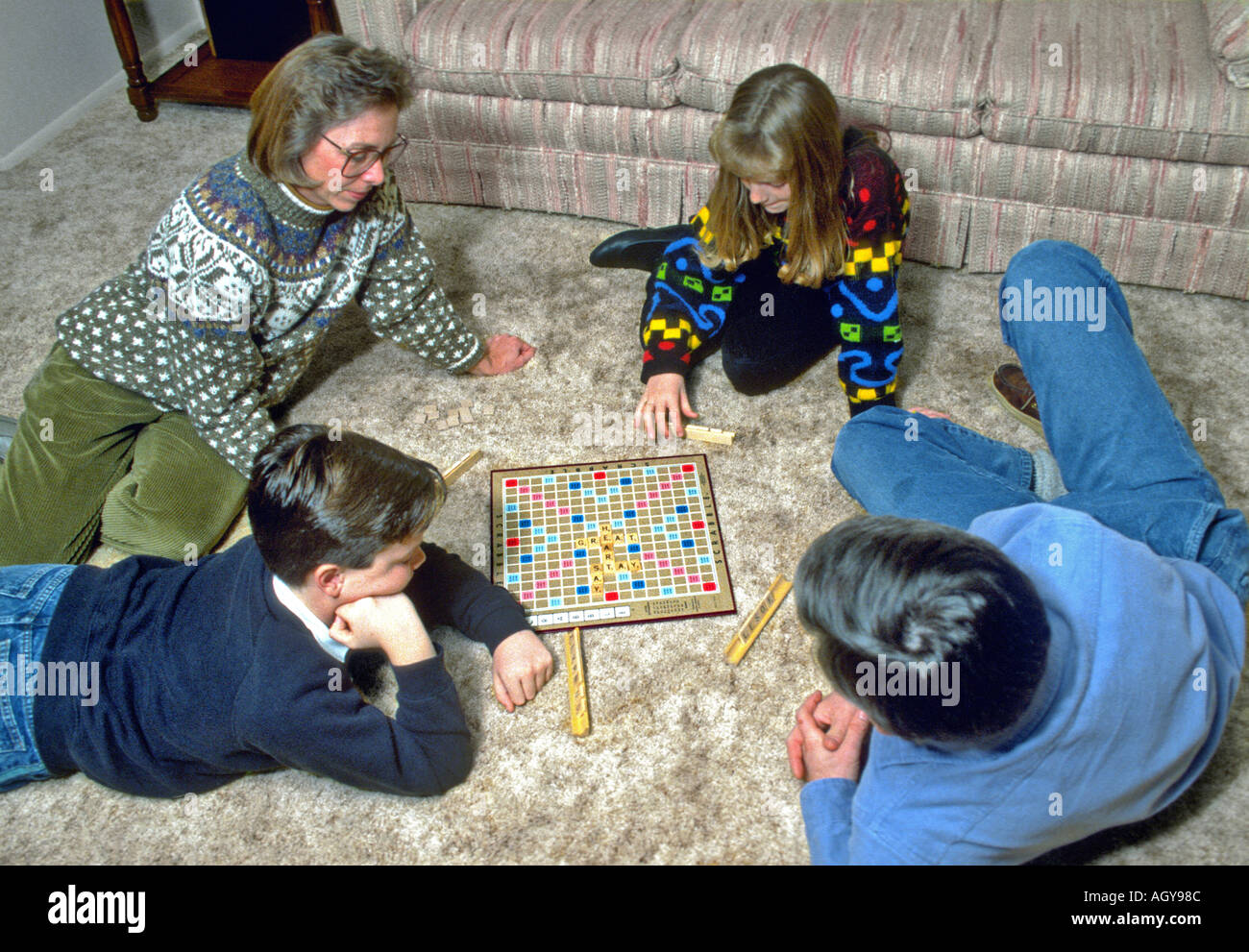 Family playing scrabble hi-res stock photography and images - Alamy