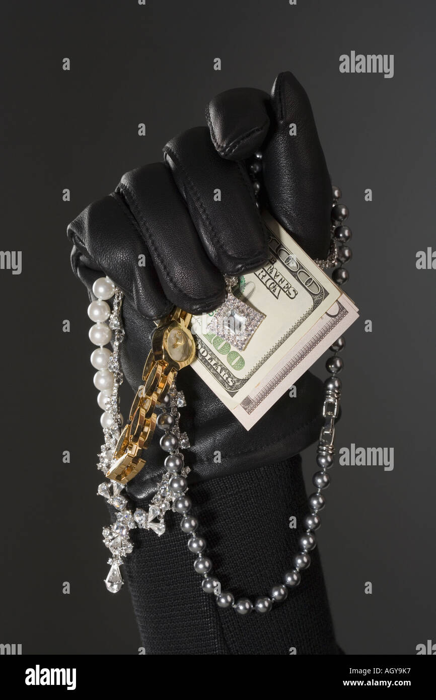 Gloved hand bracelet hi-res stock photography and images - Alamy