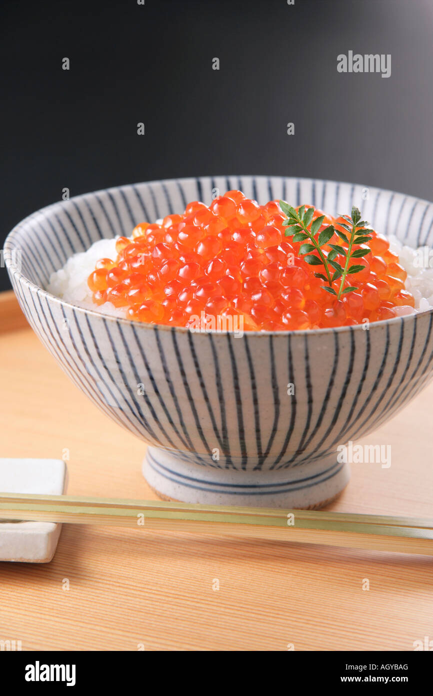 Salmon roe on rice in bowl Stock Photo - Alamy