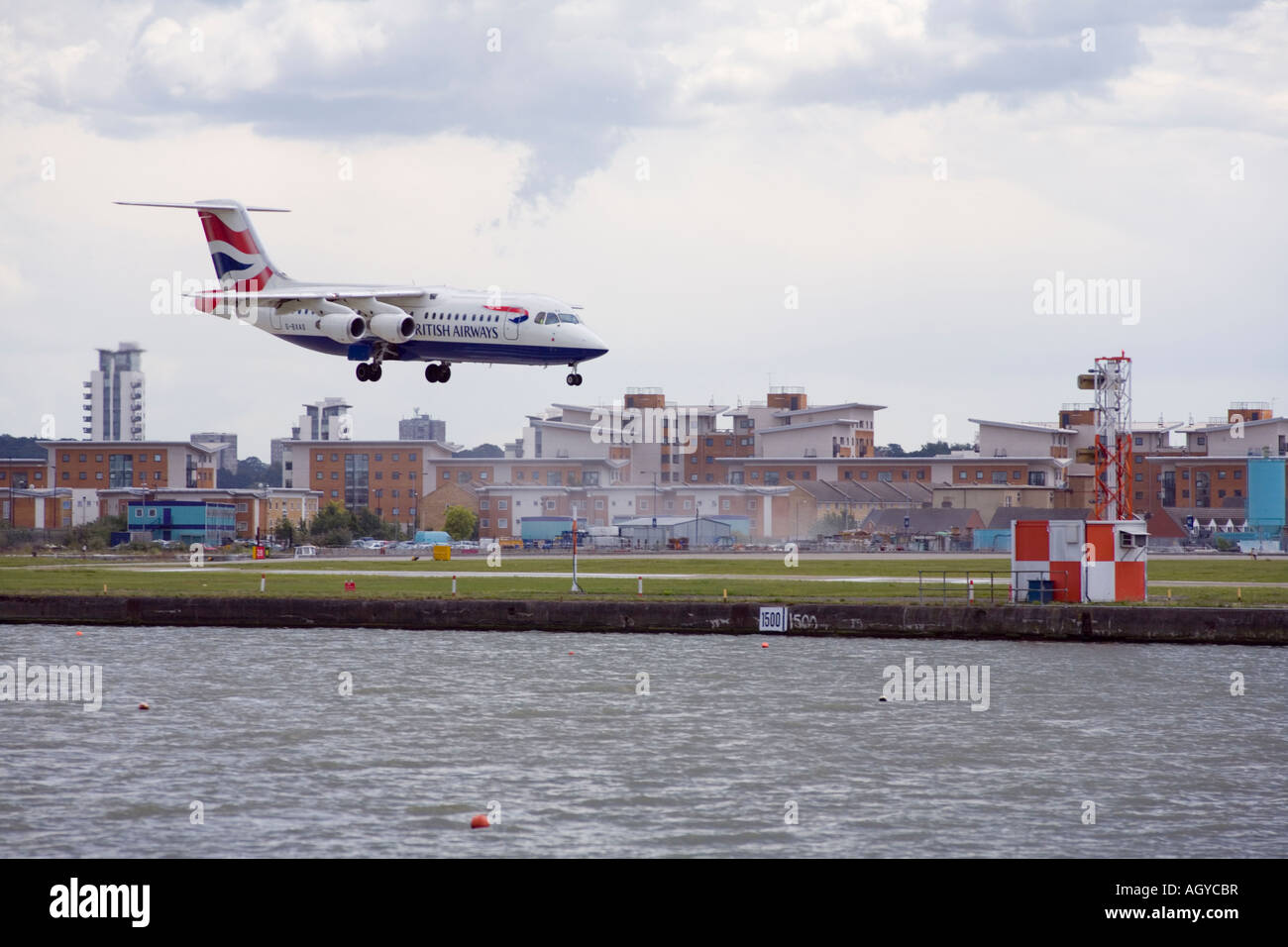 Small British Airways Jet lands at City Airport London Stock Photo - Alamy