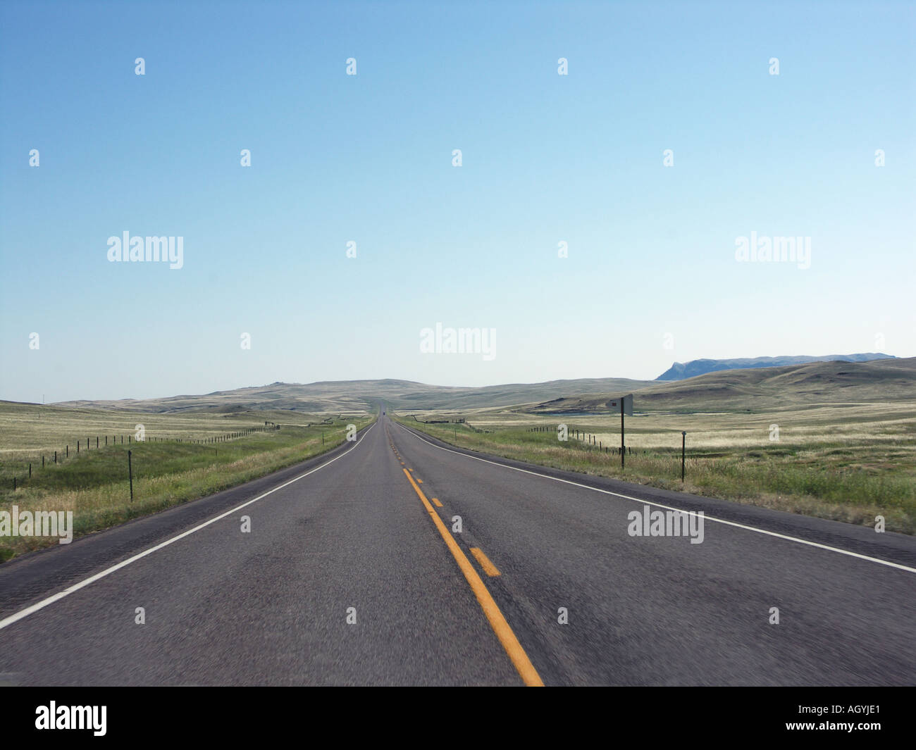 Road in the Middle of Open Spaces Out West Stock Photo - Alamy