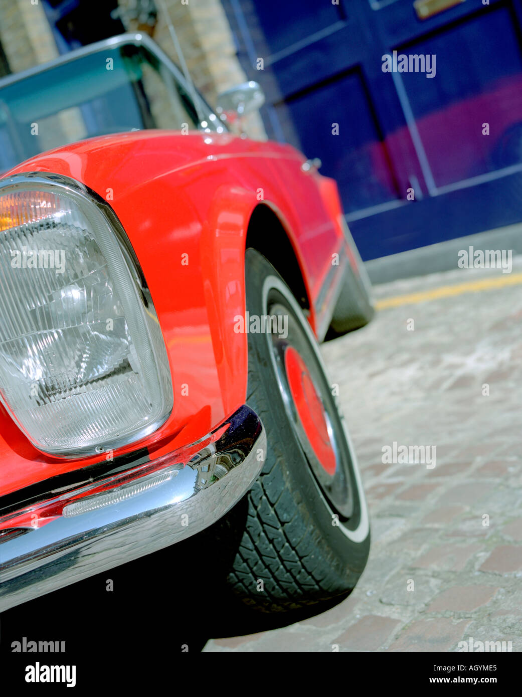 detail concepts of classic red mercedes car parked outside an expensive ...