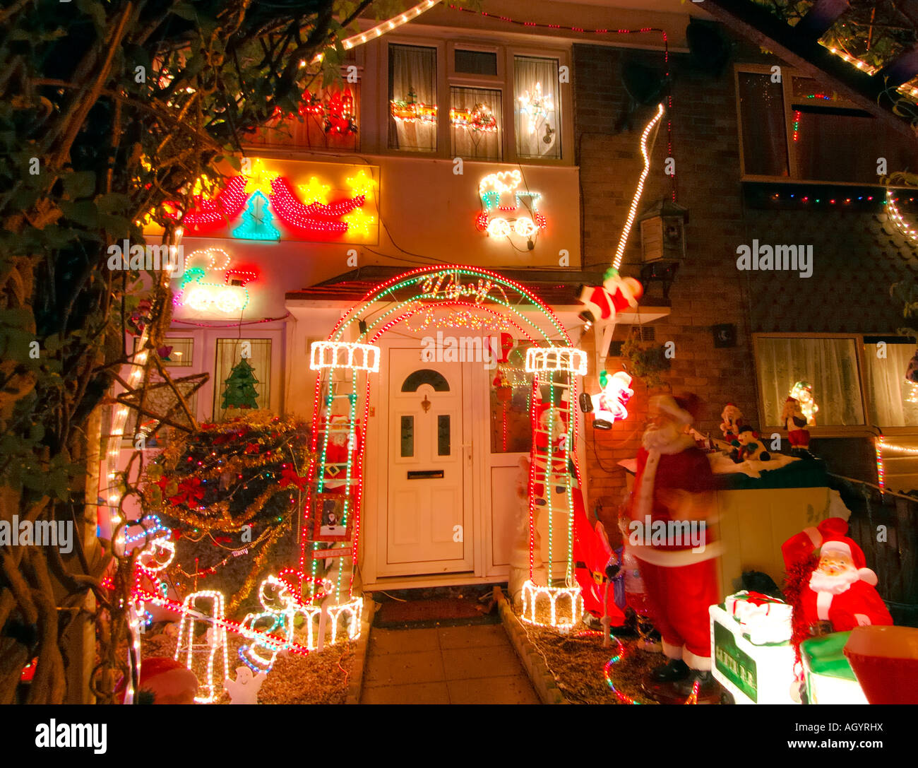 Row of Council Houses with Illuminated Christmas Decorations Stock ...