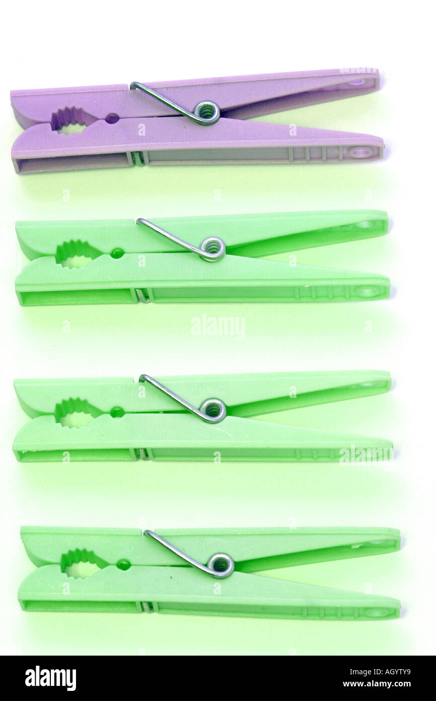 A stock photograph of a row of washing pegs Stock Photo - Alamy