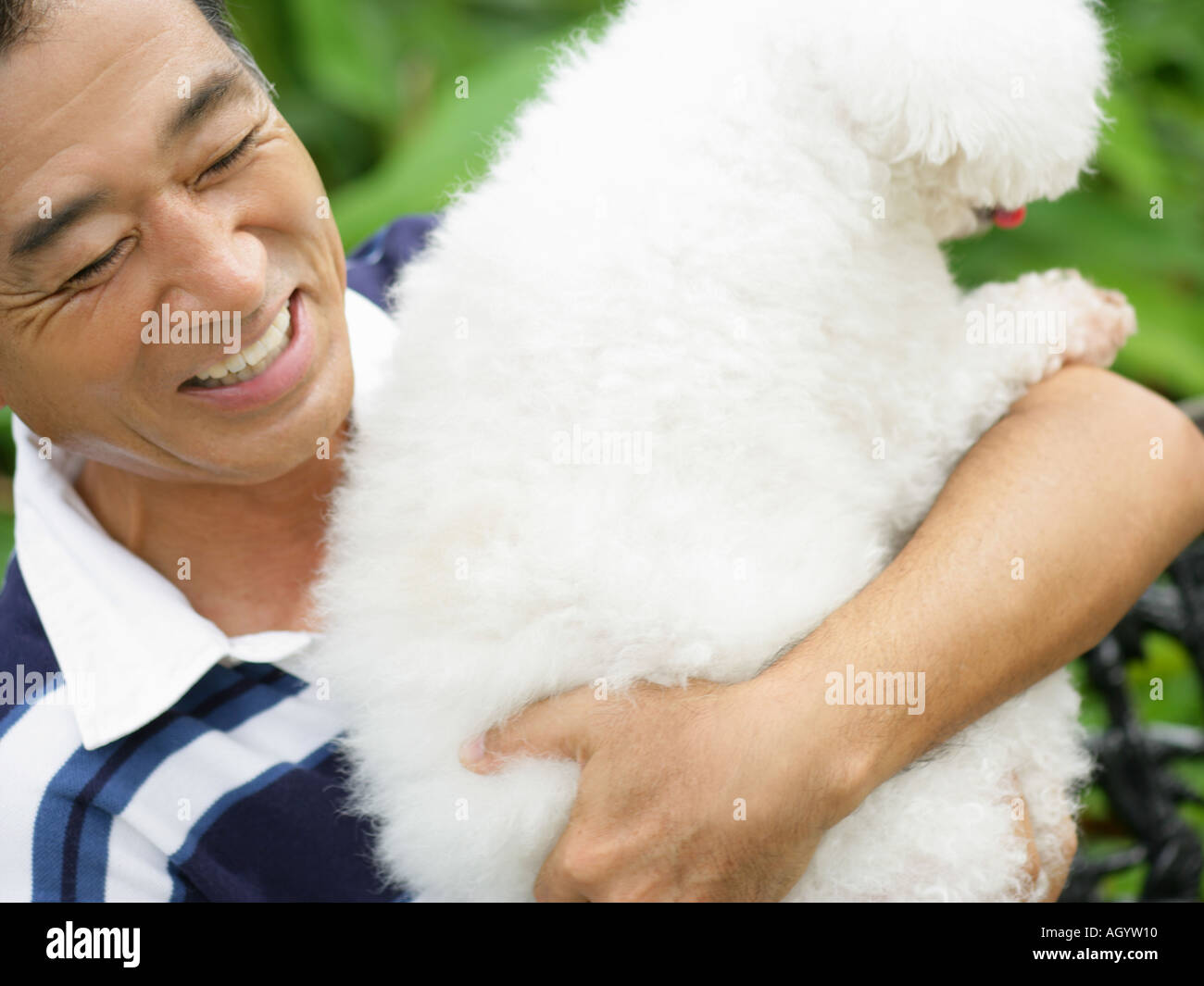 Man carrying his dog hi-res stock photography and images - Alamy
