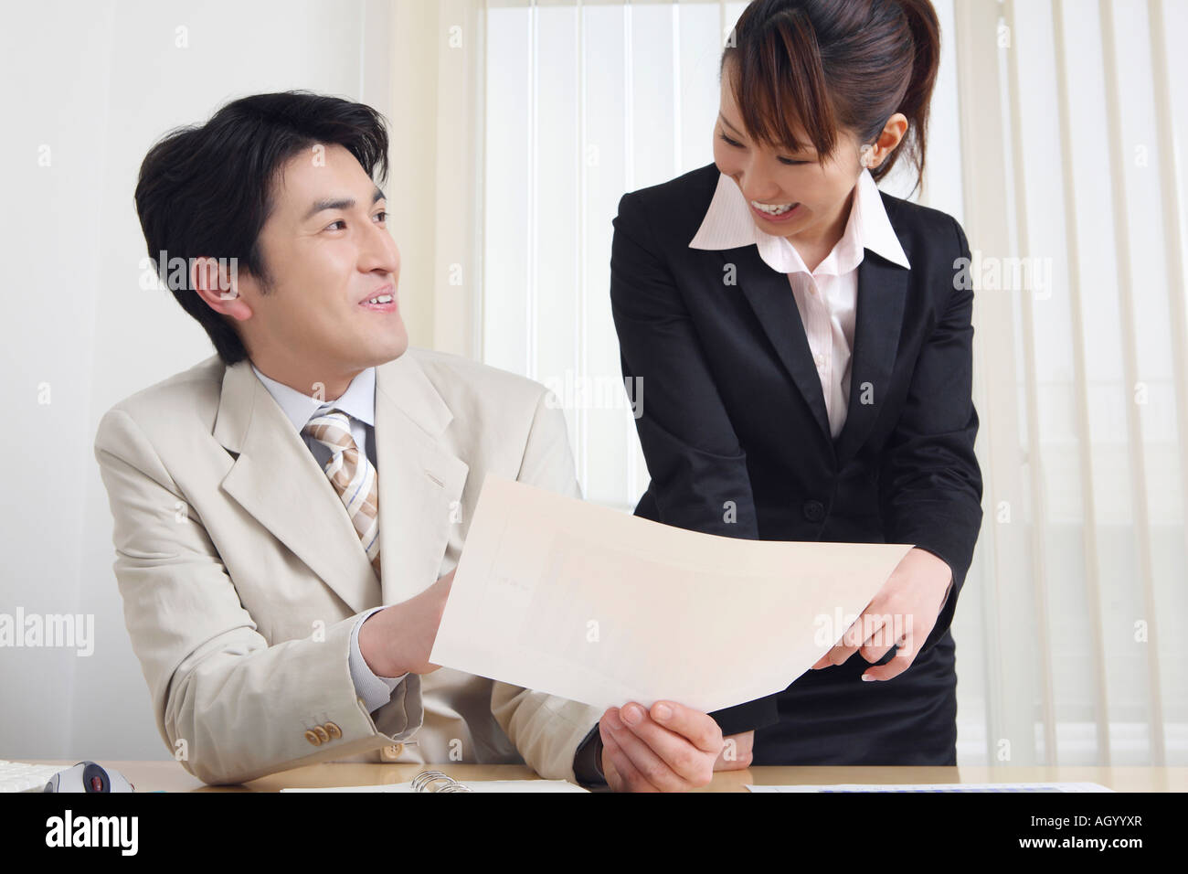 Boss and subordinate Stock Photo - Alamy