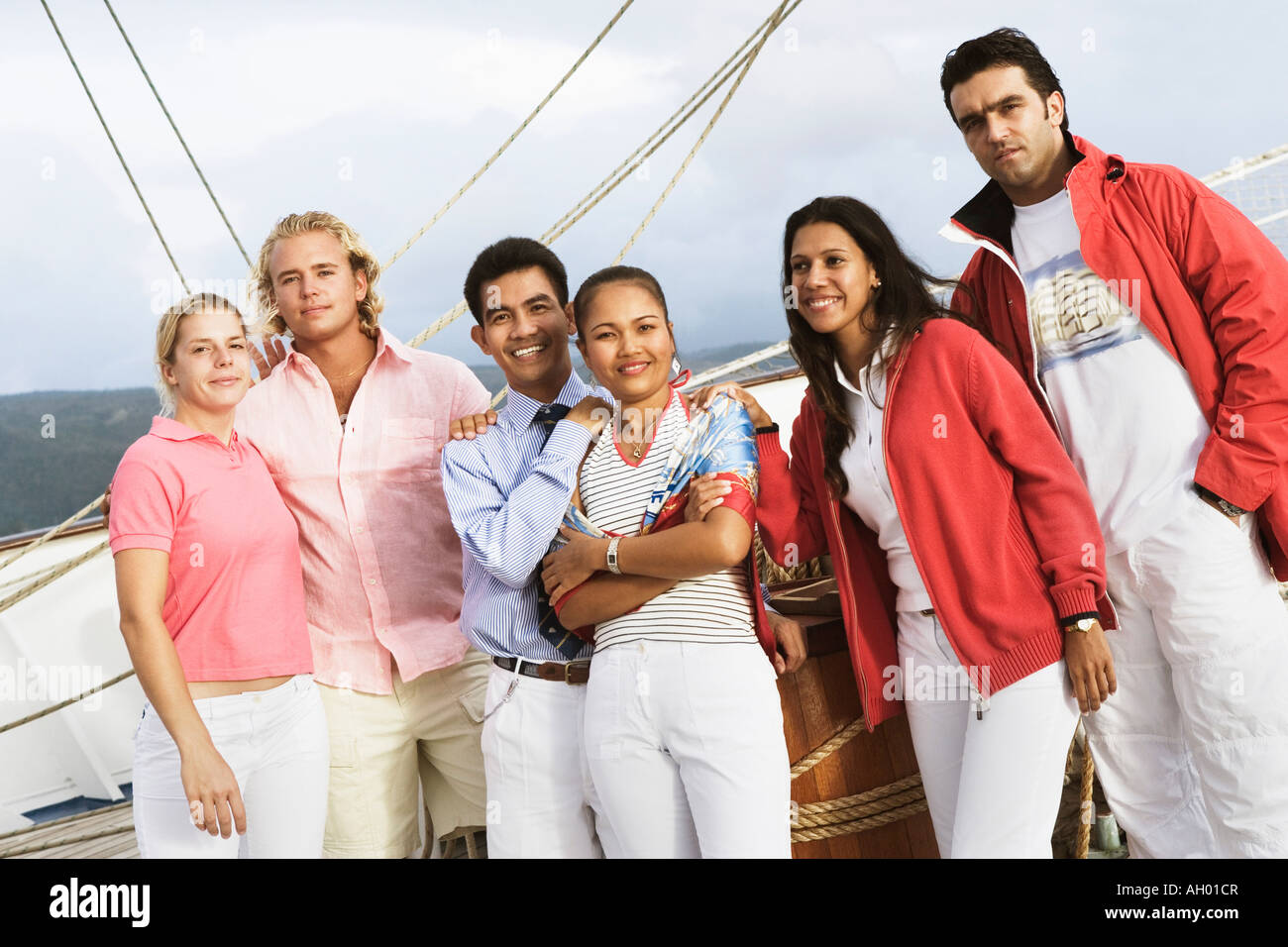 Portrait of three young couples posing Stock Photo - Alamy