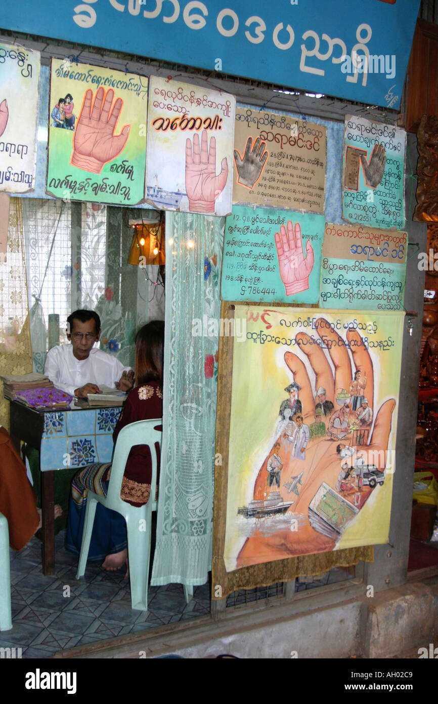 Traditional fortune teller at Chauk Htat Gyi pagoda in Yangon Myanmar ...