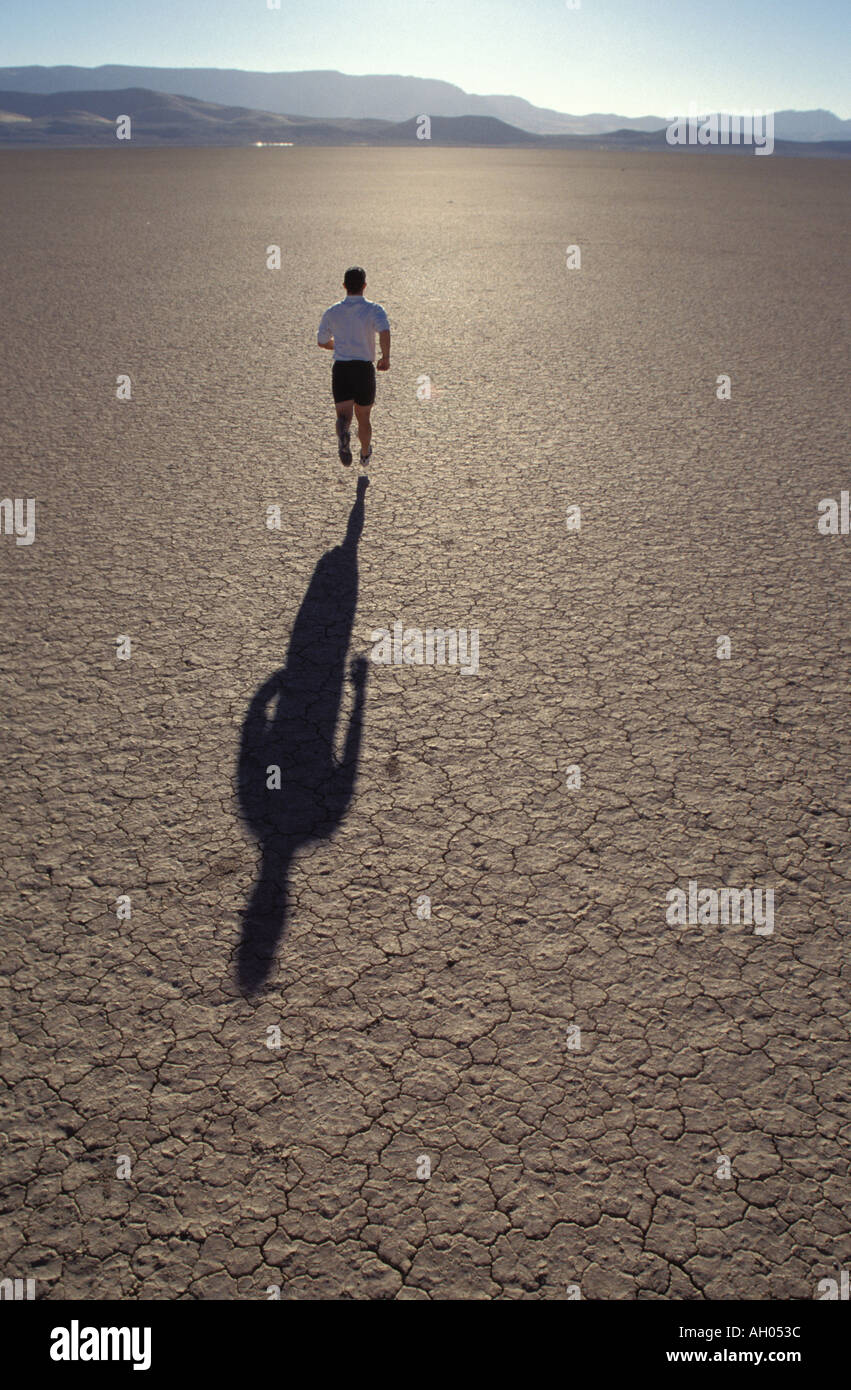 Running on Dry Flat Earth Stock Photo - Alamy