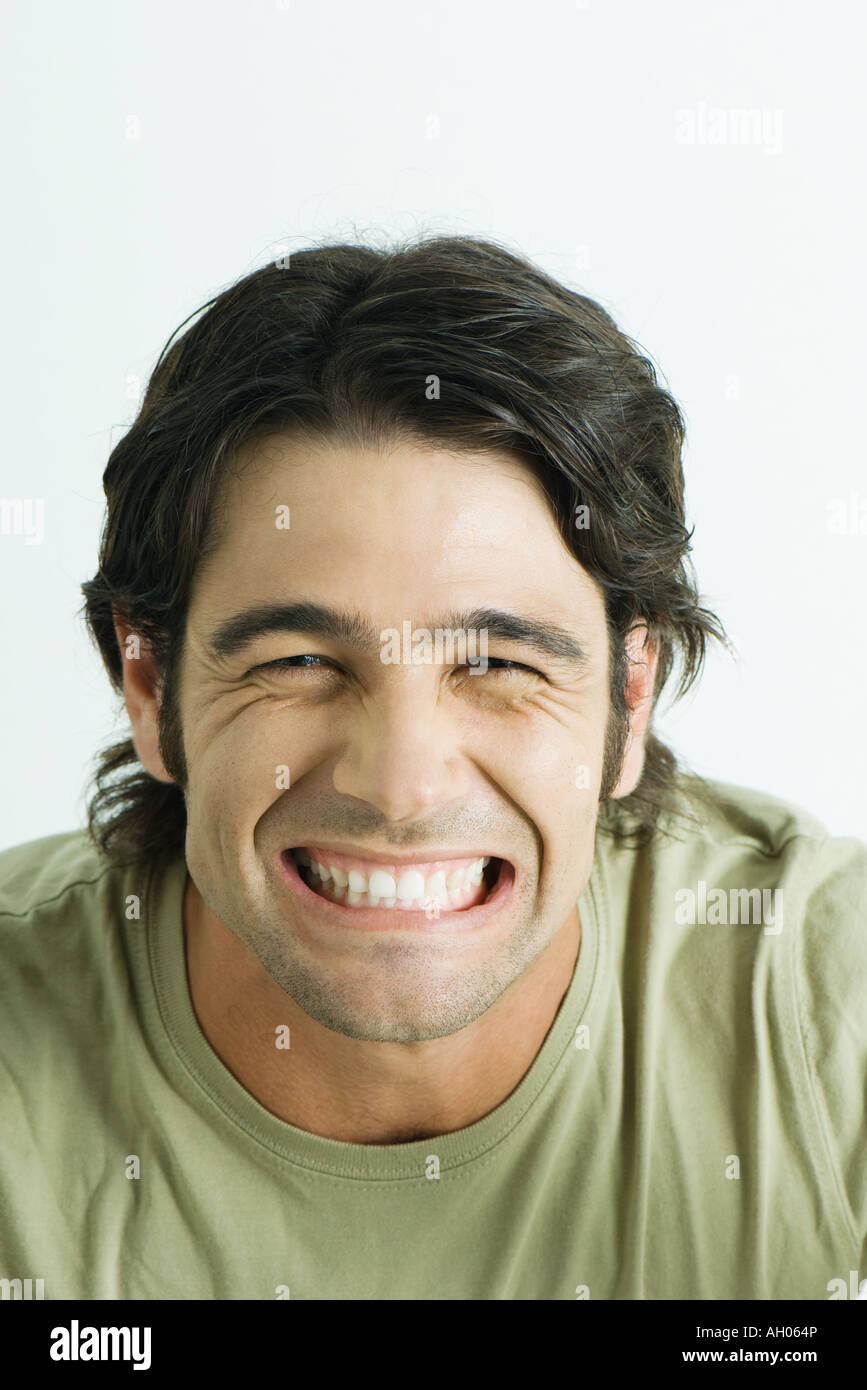 Man wincing, portrait Stock Photo - Alamy