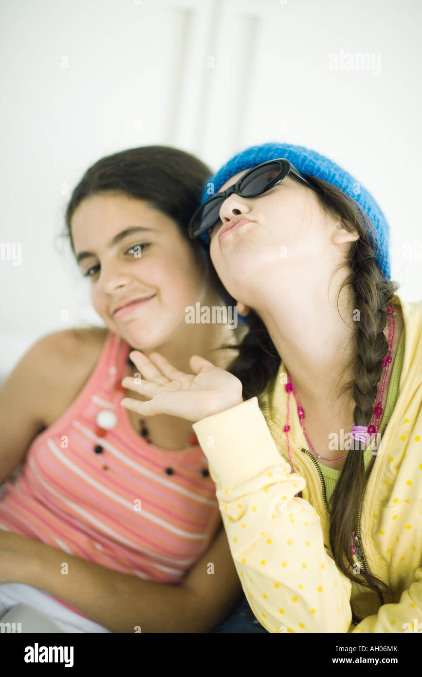 Two young female friends posing, portrait Stock Photo - Alamy