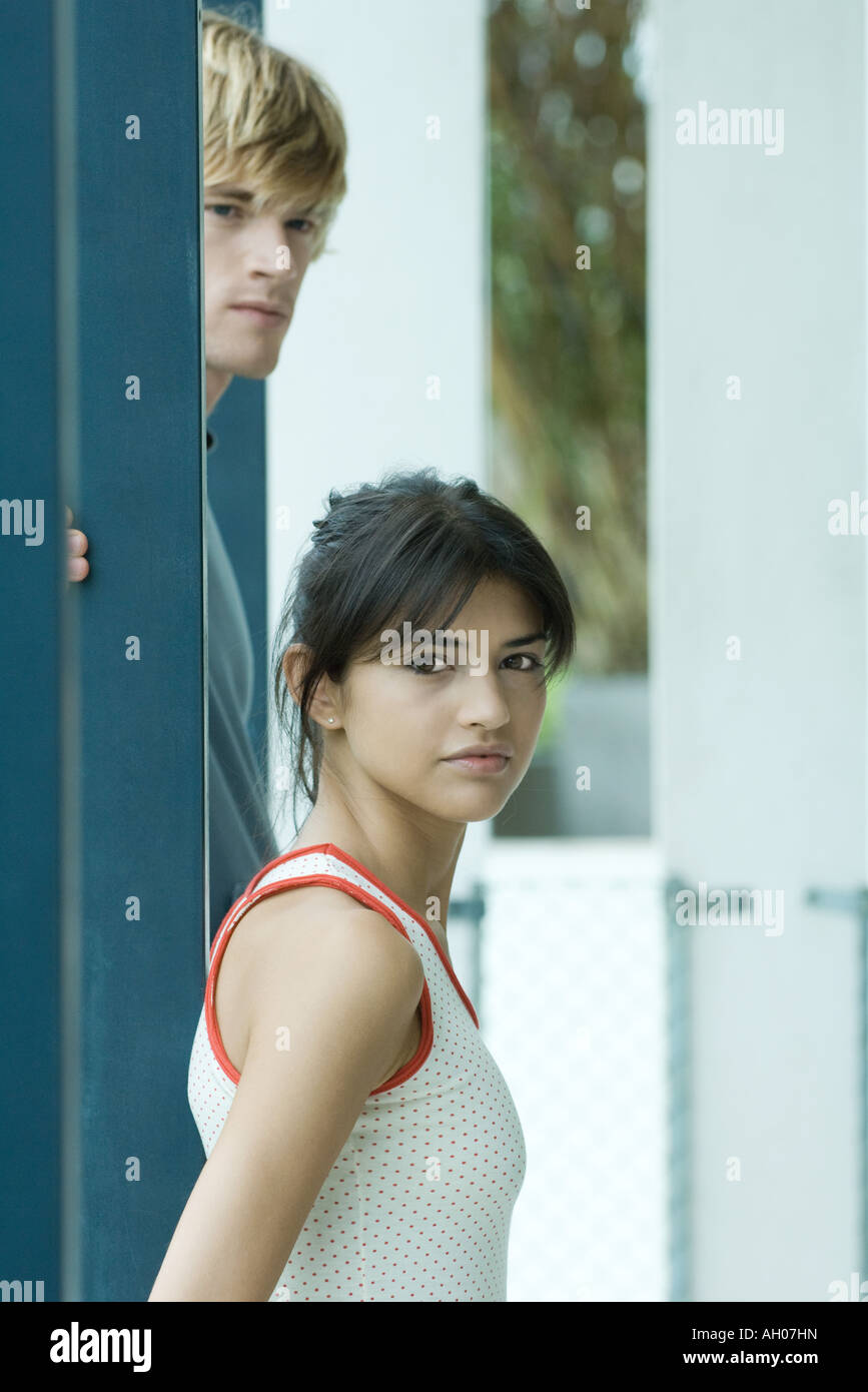 Beautiful woman glancing at man hi-res stock photography and images - Alamy