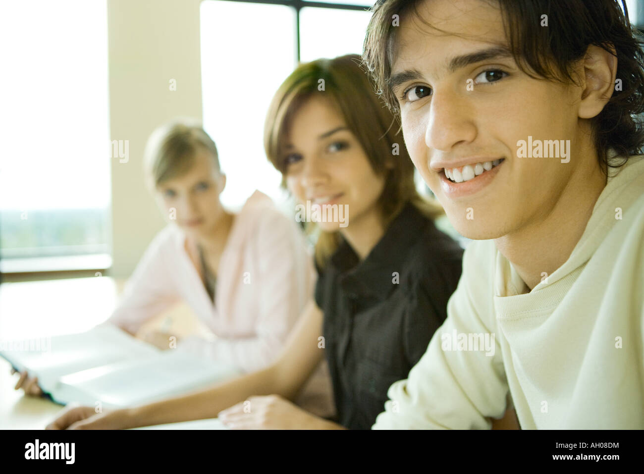 Students studying together, looking at camera, portrait Stock Photo - Alamy